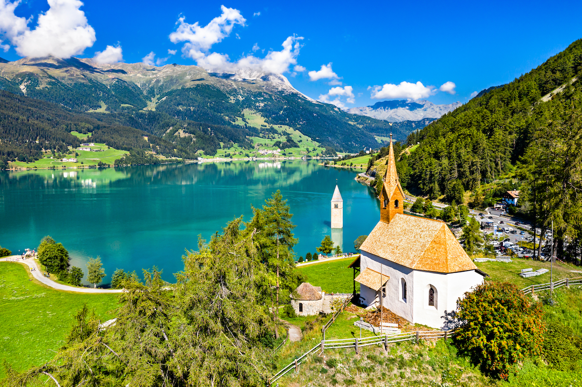The Church Tower Submerged In Lake Resia
